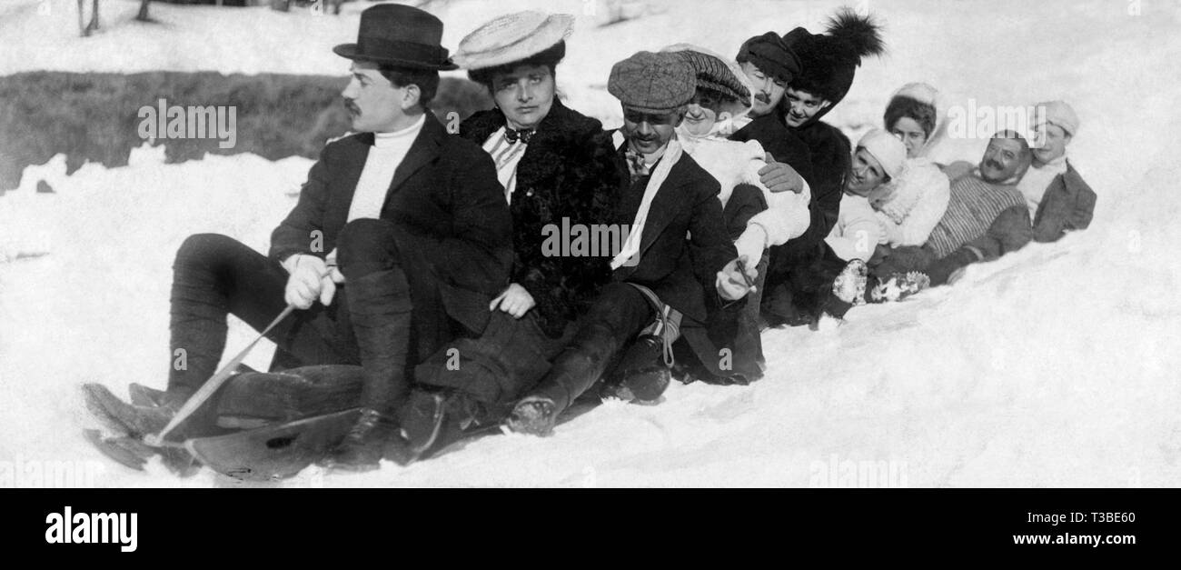 people on sleigh Stock Photo - Alamy