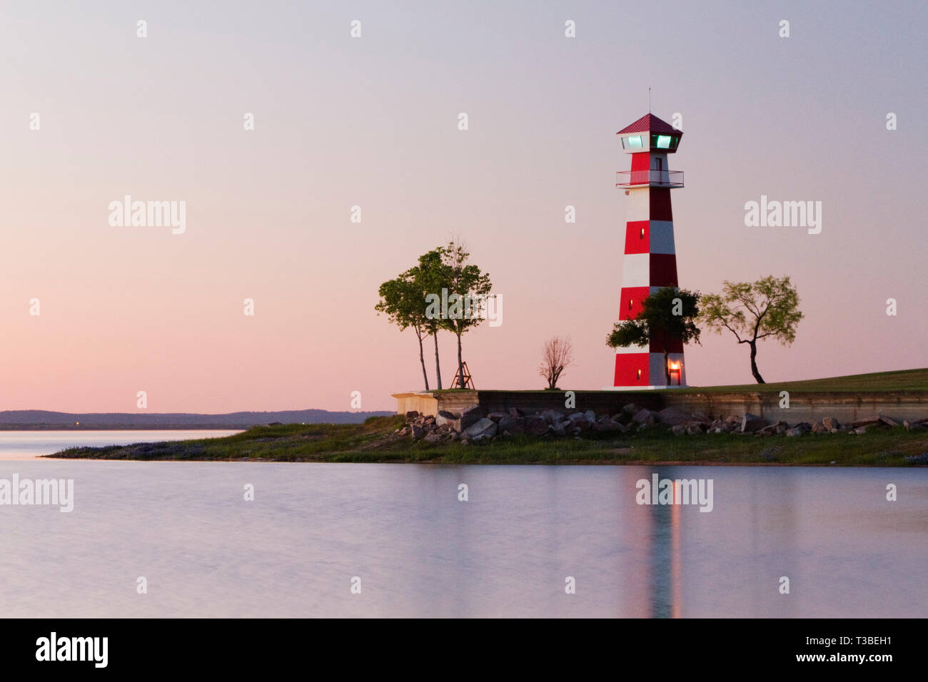 Lighthouse on a Beach Stock Photo - Alamy