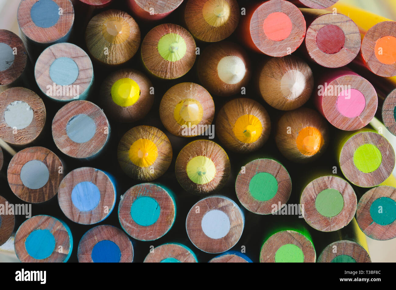 Background with wooden crayons Stock Photo - Alamy