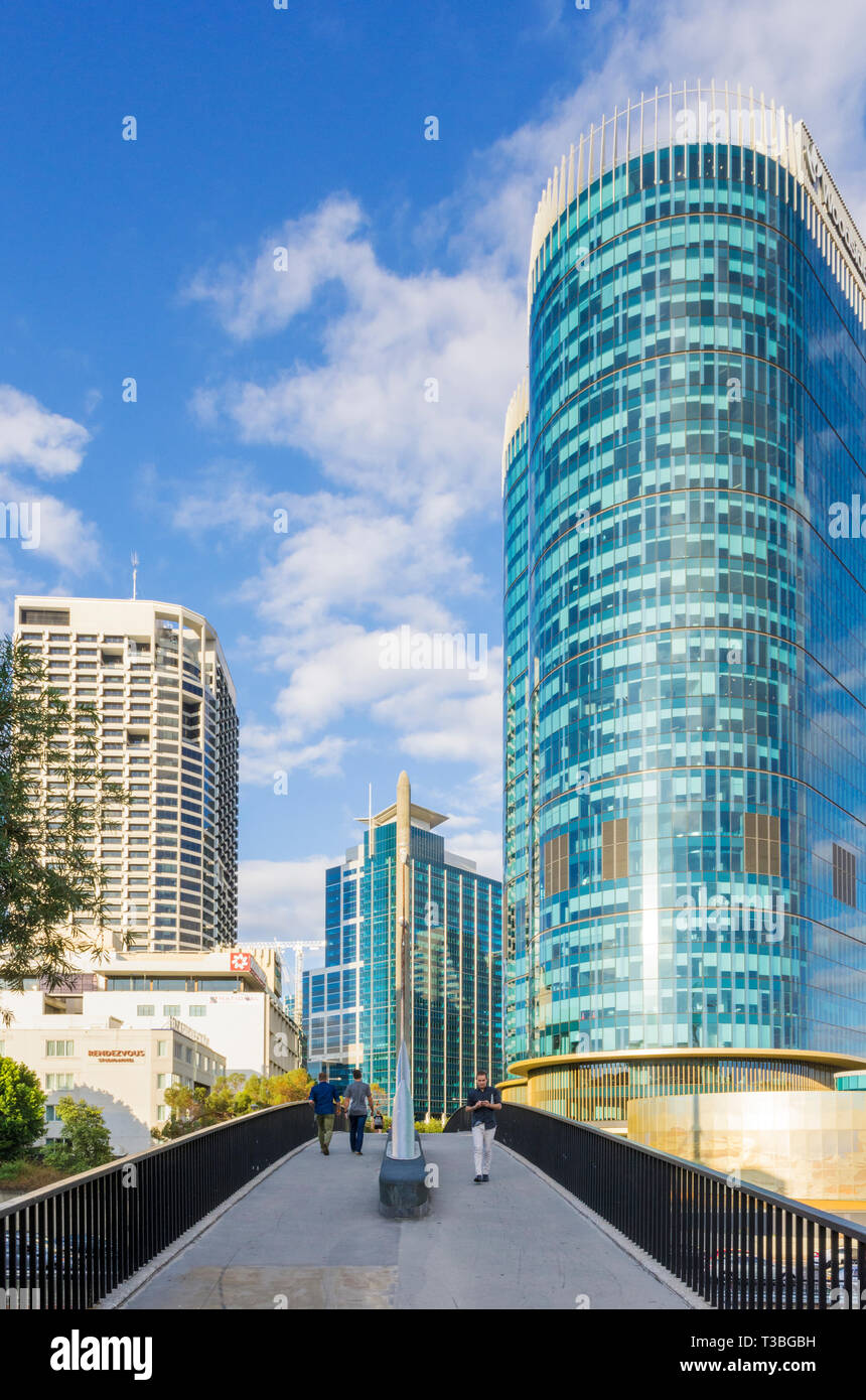 Mount Street pedestrian footbridge and glass facade of the new Woodside ...