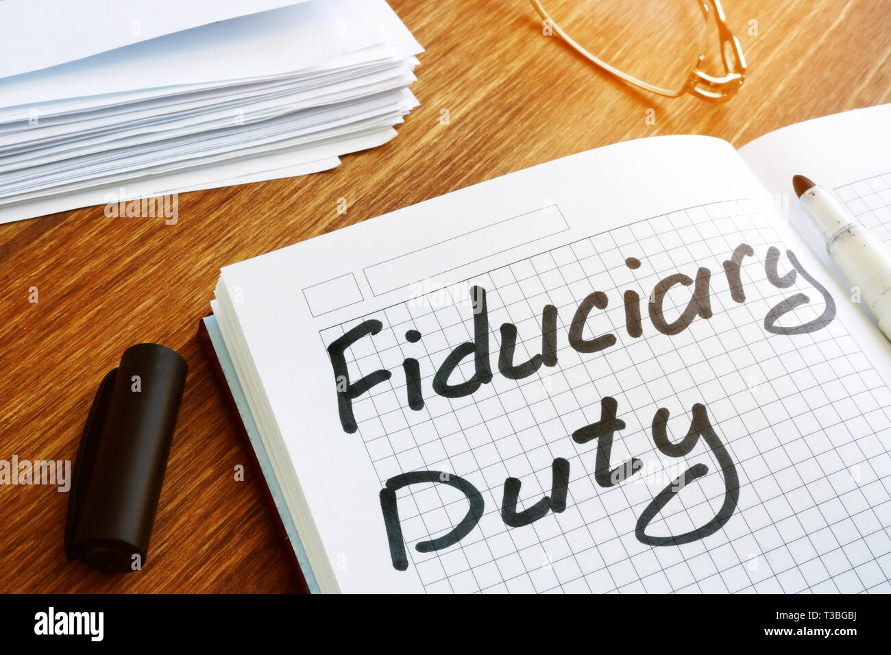 Fiduciary duty handwritten by marker on a note Stock Photo - Alamy