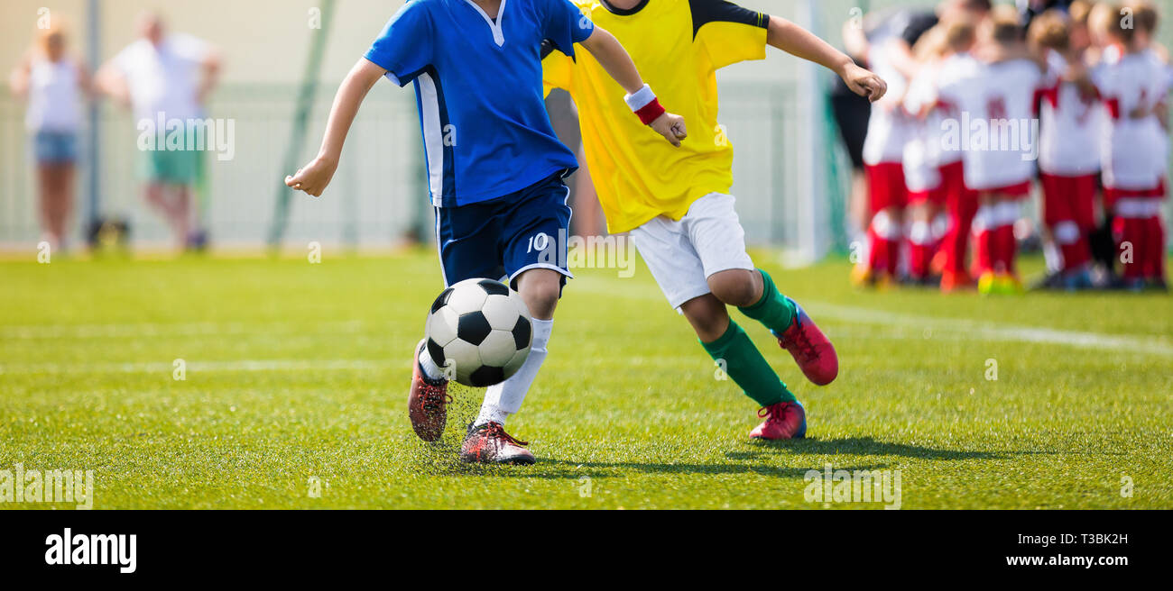 Junior Soccer Teams During Running Duel. Football Game For Youth ...