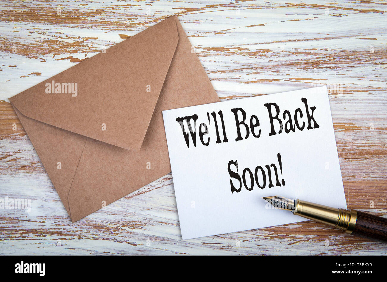 We'll Be Back Soon. Paper letter and pen Stock Photo - Alamy