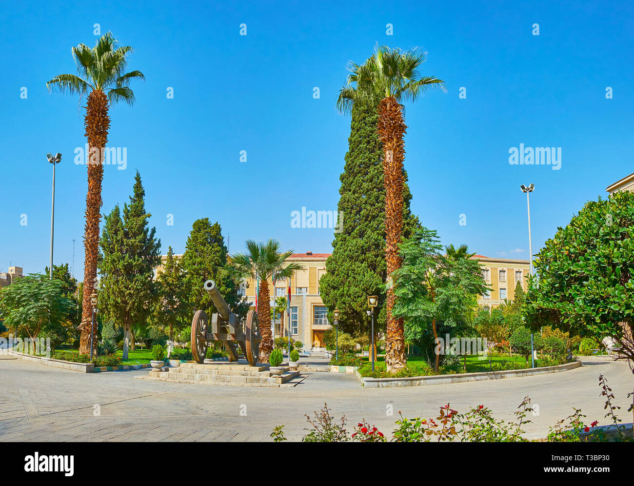 The lush greenery of Bagh-e Melli garden surrounds the buildings of ...