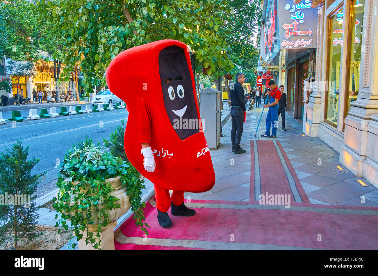 TEHRAN, IRAN - OCTOBER 10, 2017: The person in creative costume of red ...