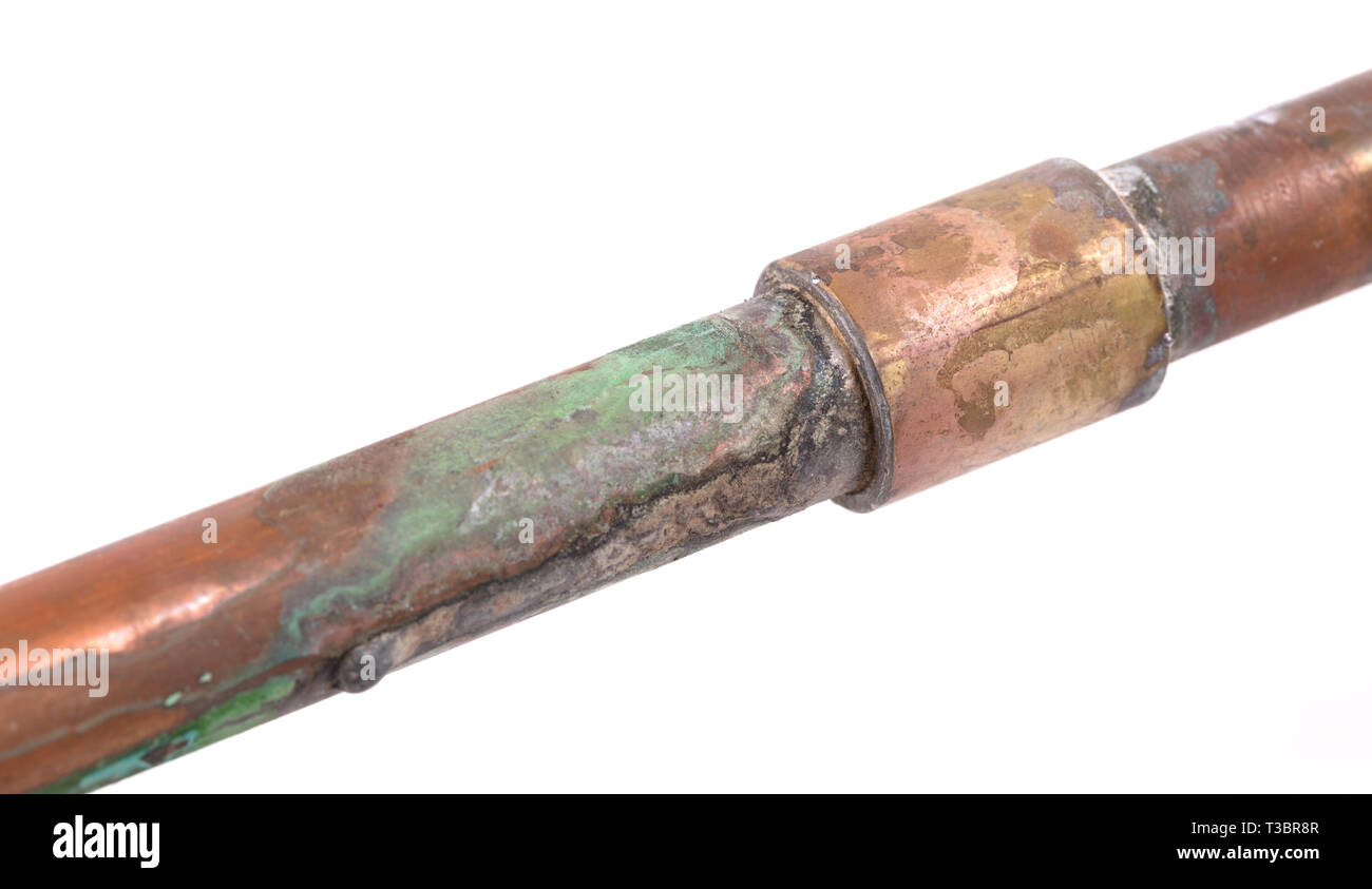 Old brass pipe, isolated on a white background Stock Photo - Alamy