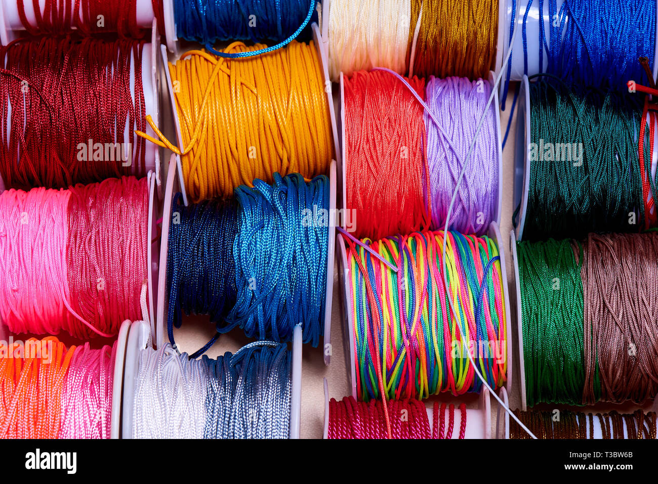 Collection of bright multi-colored ropes close-up Stock Photo - Alamy