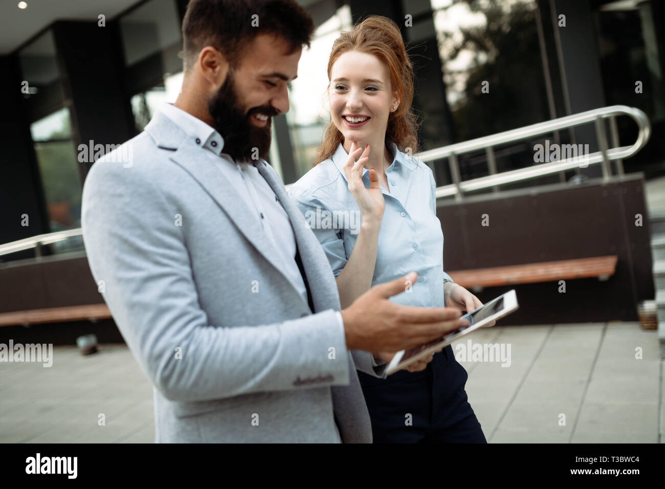 Business colleagues talking on break from work Stock Photo - Alamy
