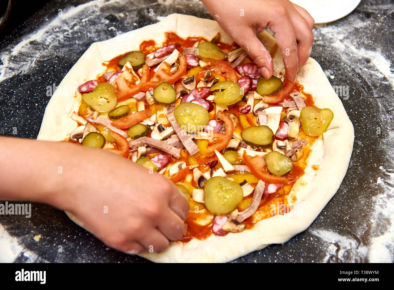 The process of making pizza Stock Photo - Alamy
