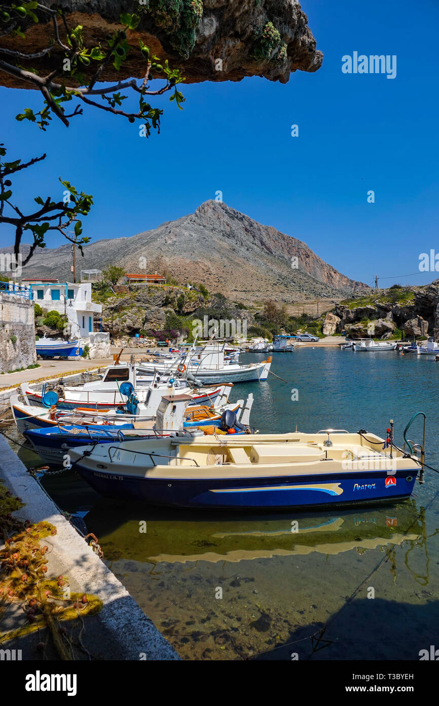 Tiny harbour and fishing boats at village of Profitis Ilias,near ...