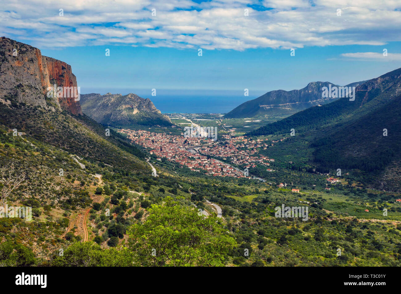 The town of Leonidio and the surrounding cliffs in spring, springtime ...