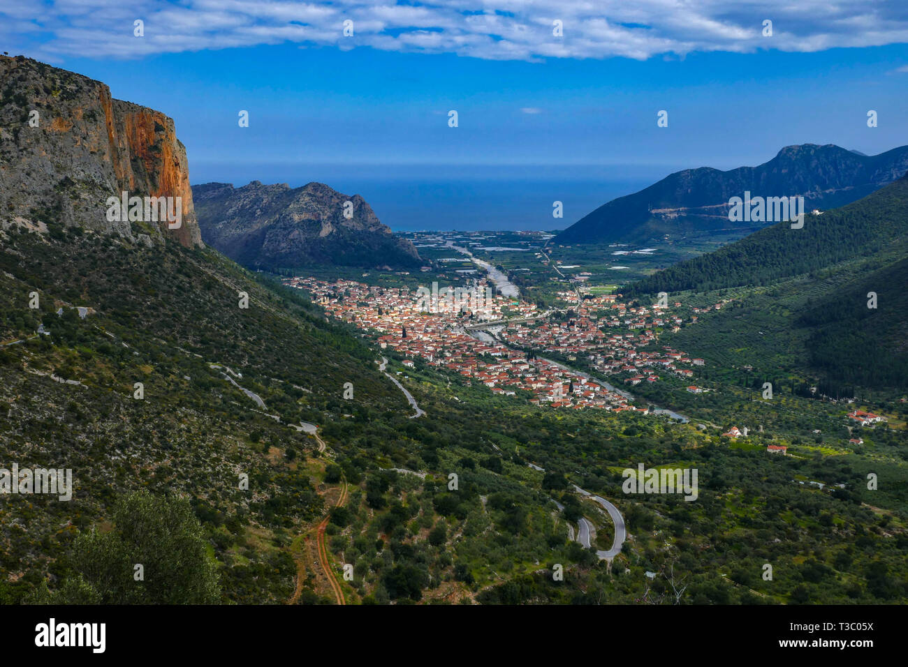 The town of Leonidio and the surrounding cliffs in spring, springtime ...