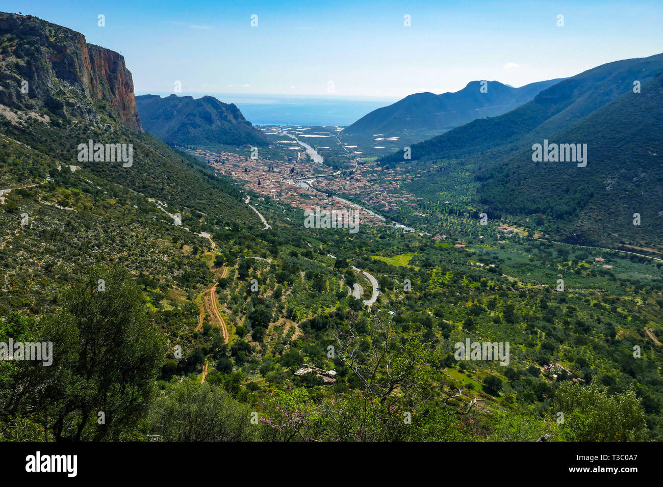 The town of Leonidio and the surrounding cliffs in spring, springtime ...