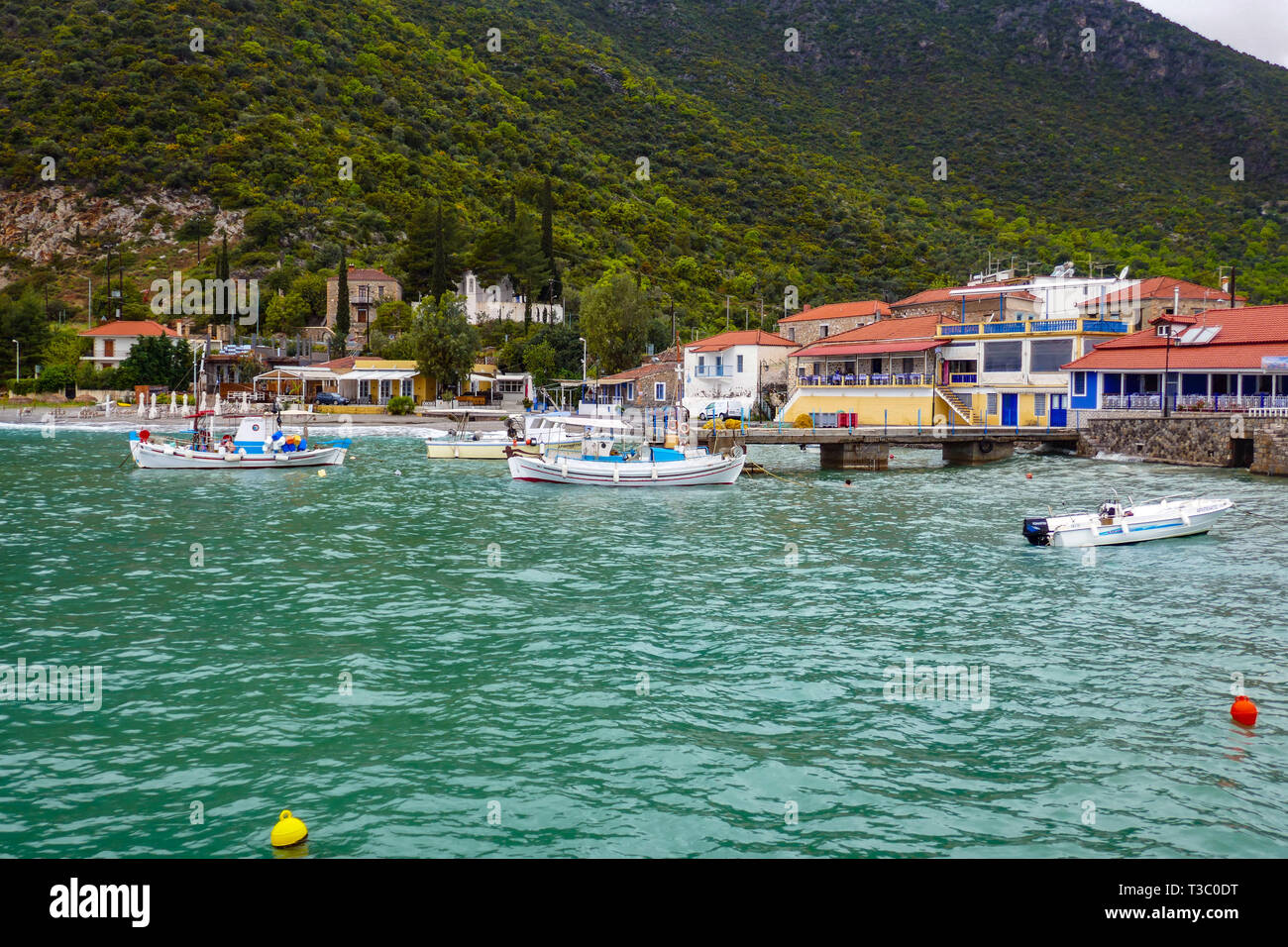 Small boats and choppy sea at the harbour of Plaka, Leonidio ...