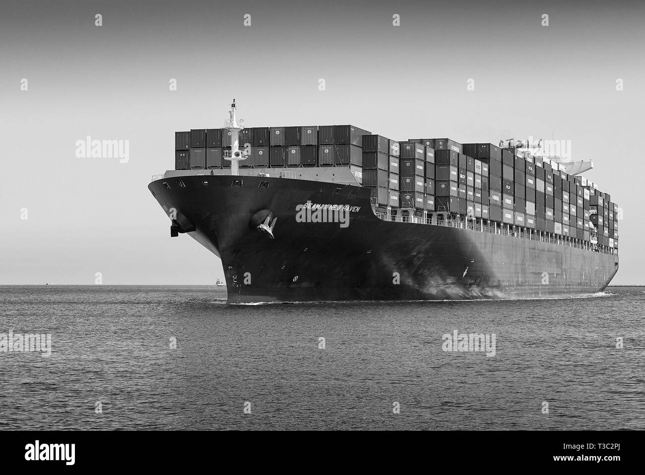 Black and white photo of a container ship entering port Black and White ...