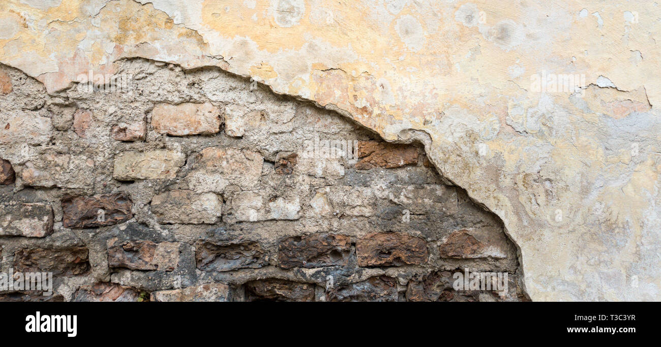 Old brick wall with peel stucco texture. Retro vintage worn wall ...