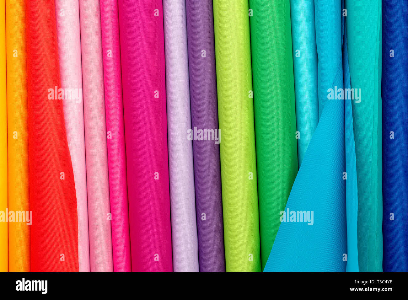 Colorful fabric and textiles. Sewing industry concept Stock Photo - Alamy