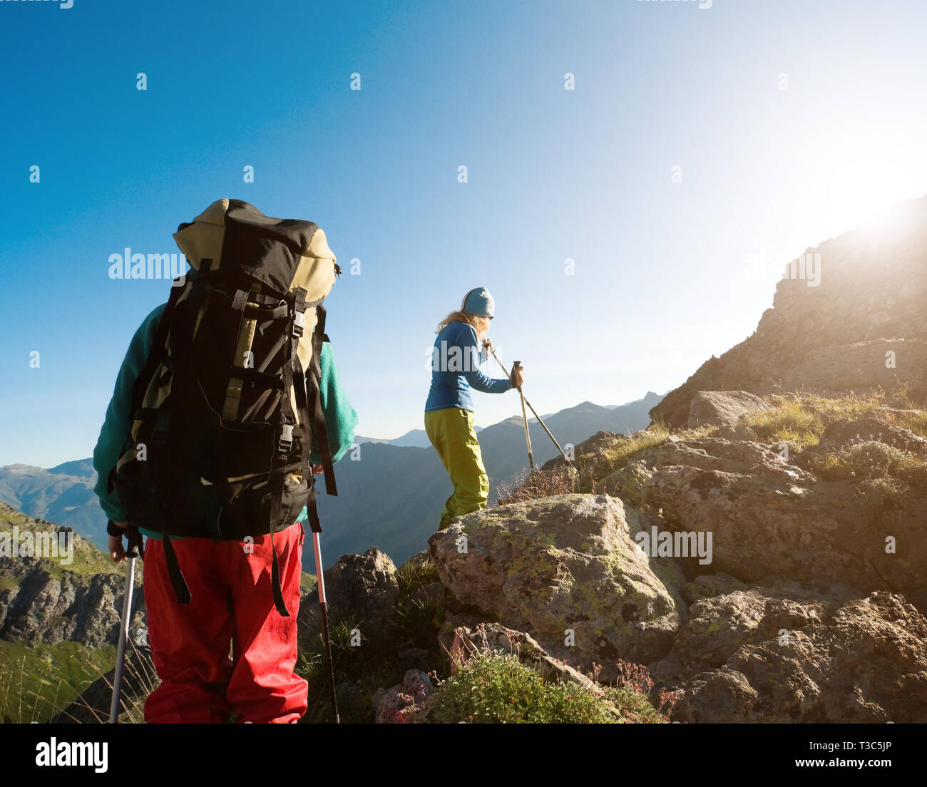 Hiking in the mountain hi-res stock photography and images - Alamy