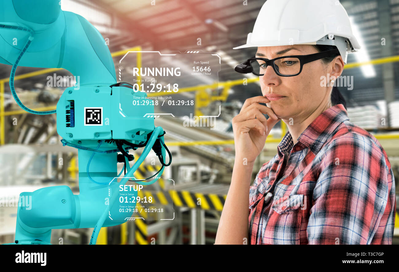 Virtual Augmented reality technology in industry 4.0. Engineer woman ...