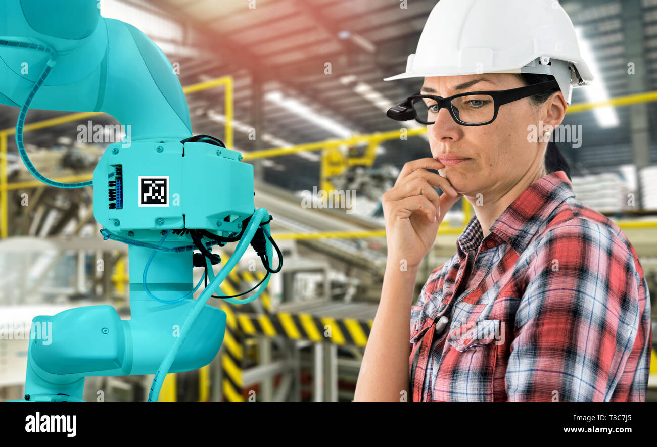 Virtual Augmented reality technology in industry 4.0. Engineer woman ...