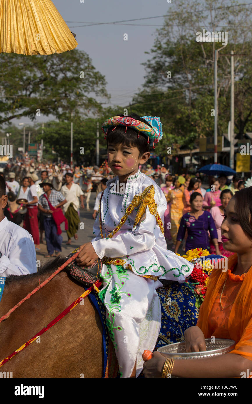Traditional Buddhist Shinbyu procession for the initiation of all young ...