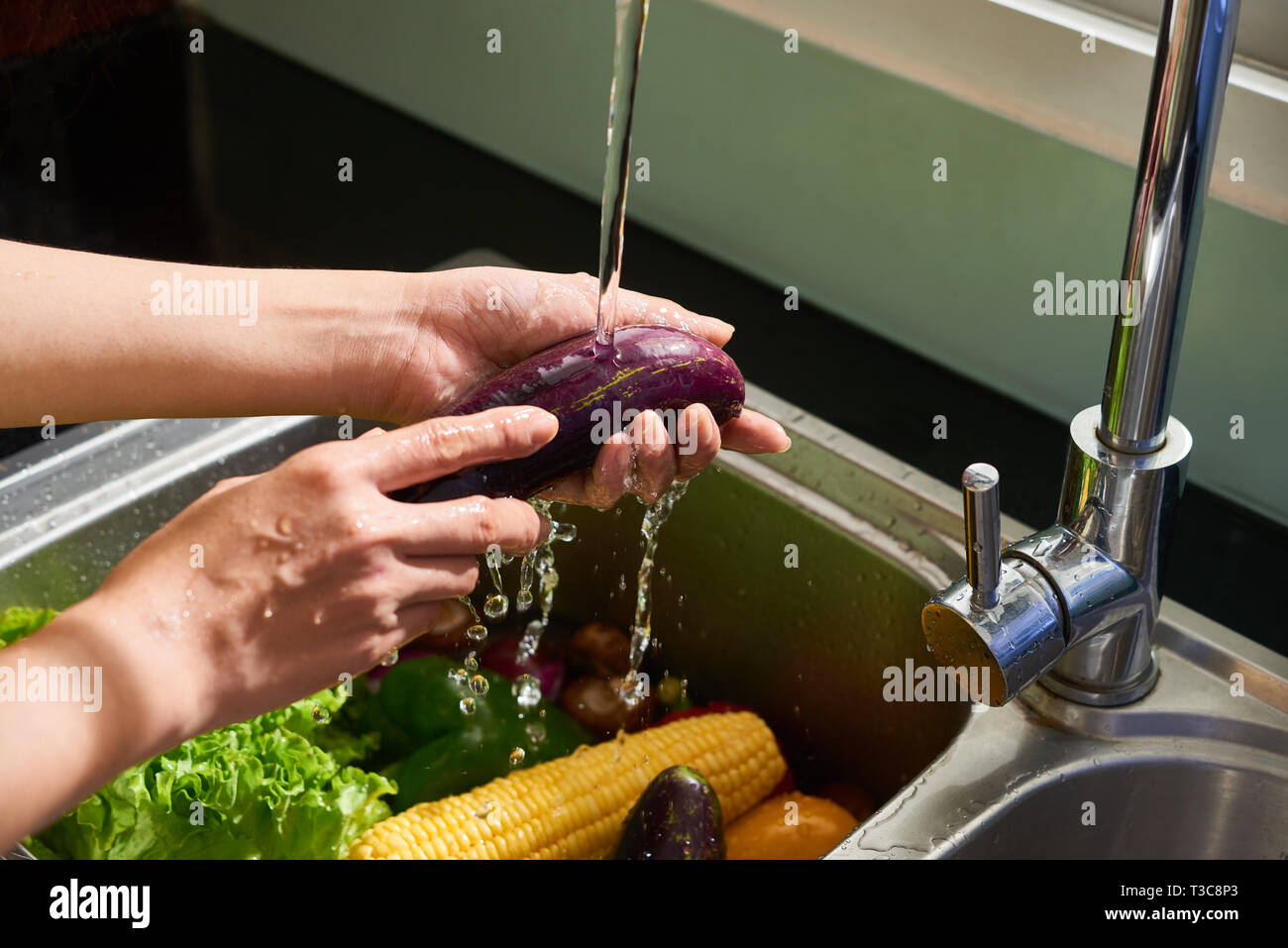 Rinsing hands hi-res stock photography and images - Alamy