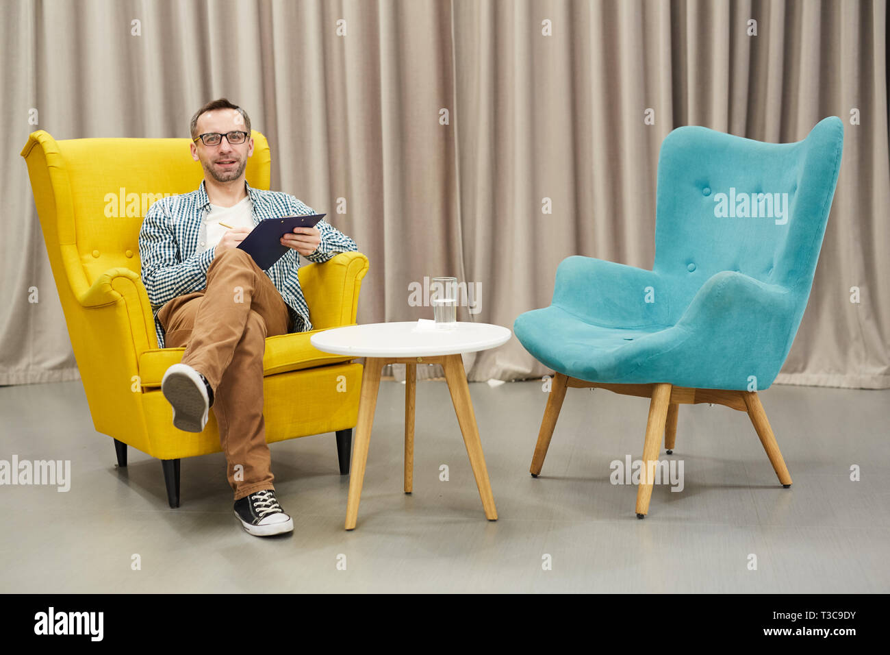 Portrait male psychologist sitting hi-res stock photography and images ...