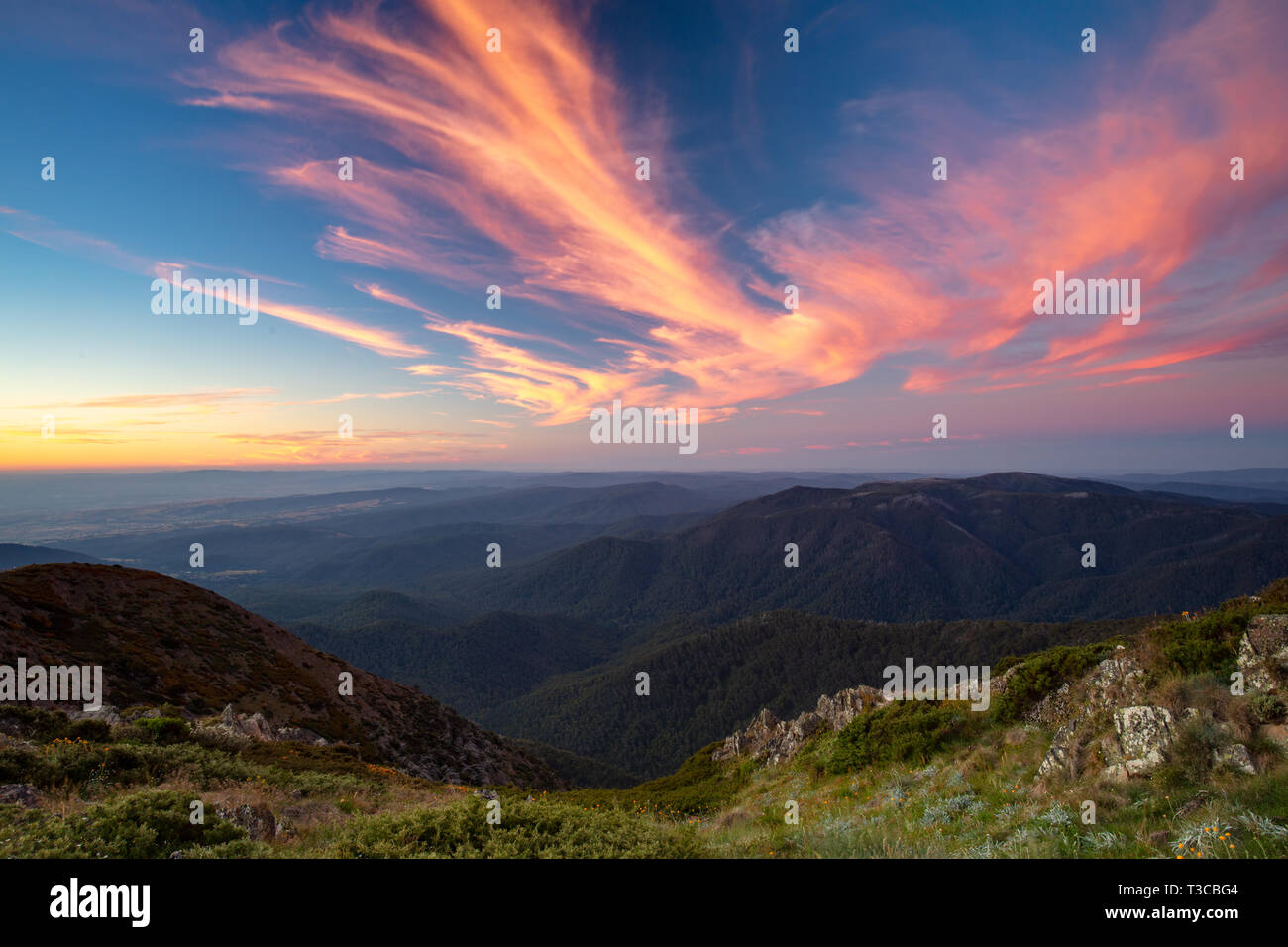 The view at sunset from the summit of Mt Buller over the Victorian Alps ...