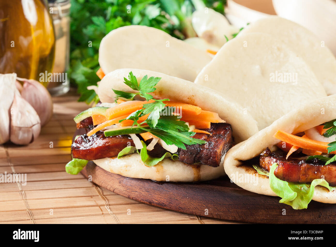 Gua bao, steamed buns with pork belly and vegetable. Asian cuisine ...