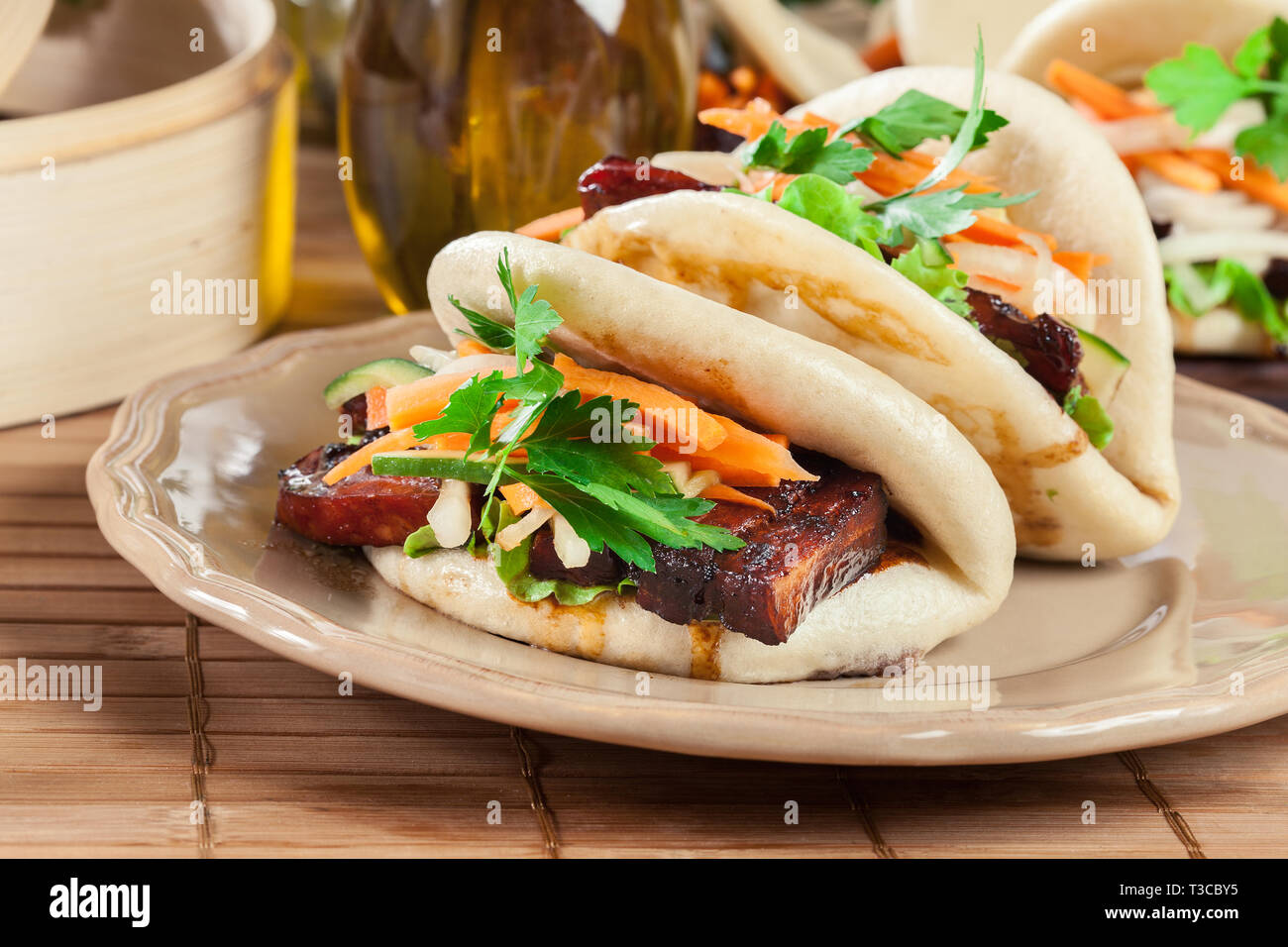 Gua bao, steamed buns with pork belly and vegetable. Asian cuisine ...