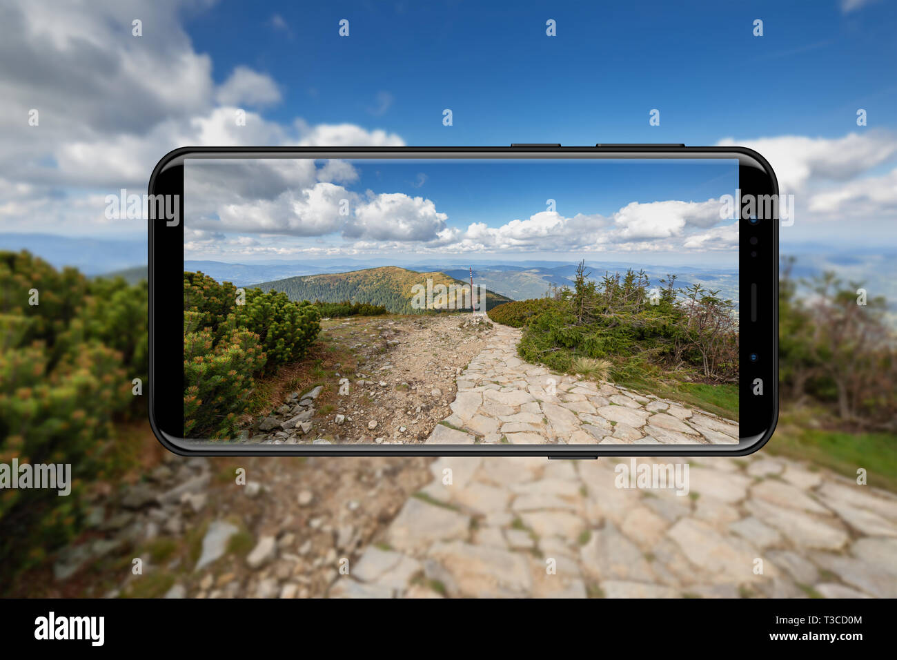 Brand new smartphone black color with mountain landscape photo mockup ...