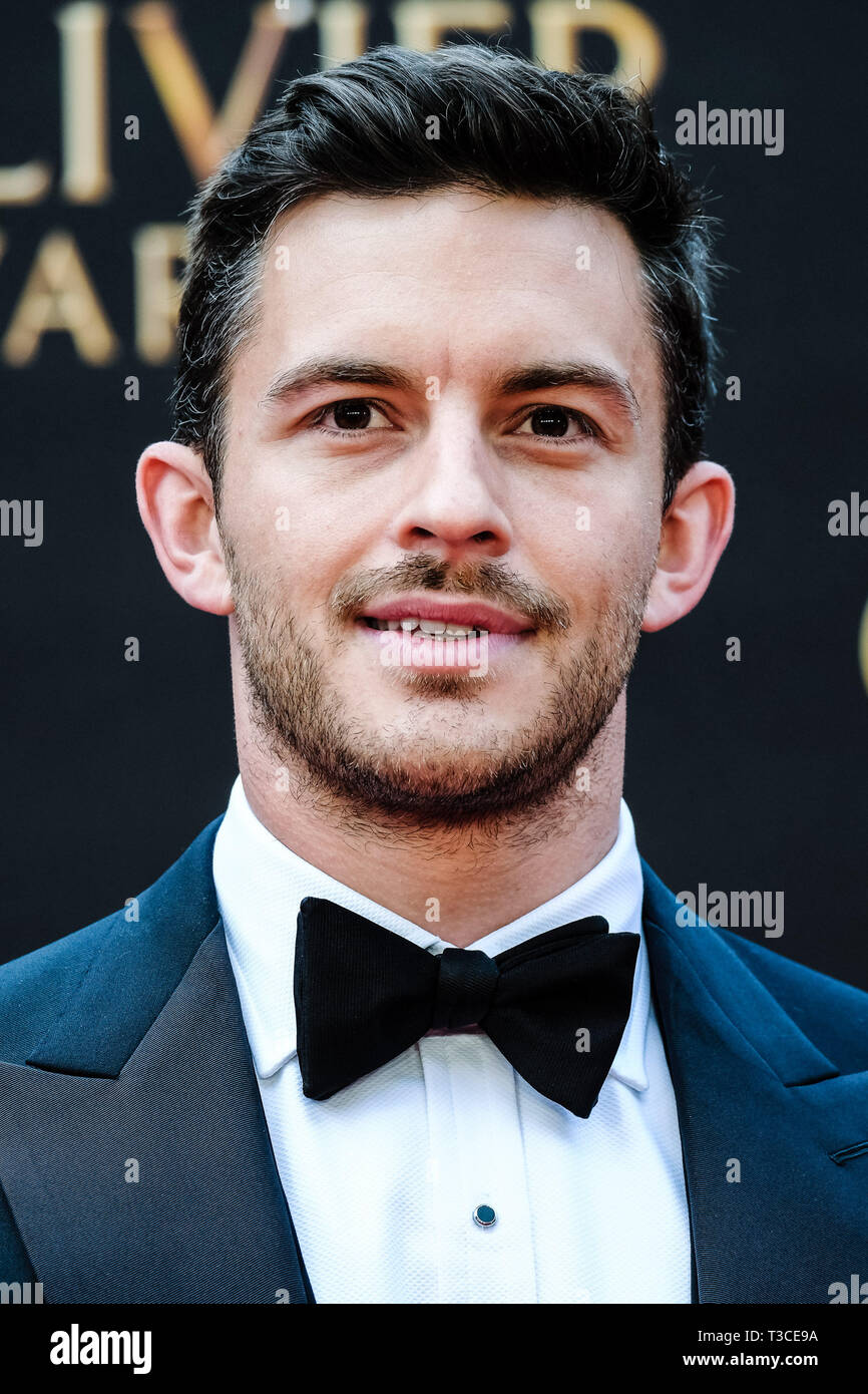 Jonathan Bailey poses on the red carpet at the Olivier Awards on Sunday ...