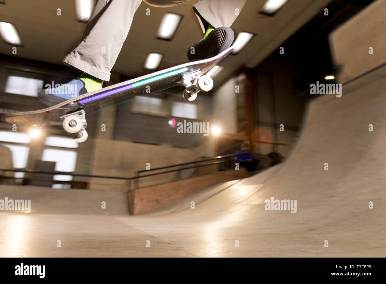 Skateboarder doing jump trick hi-res stock photography and images - Alamy