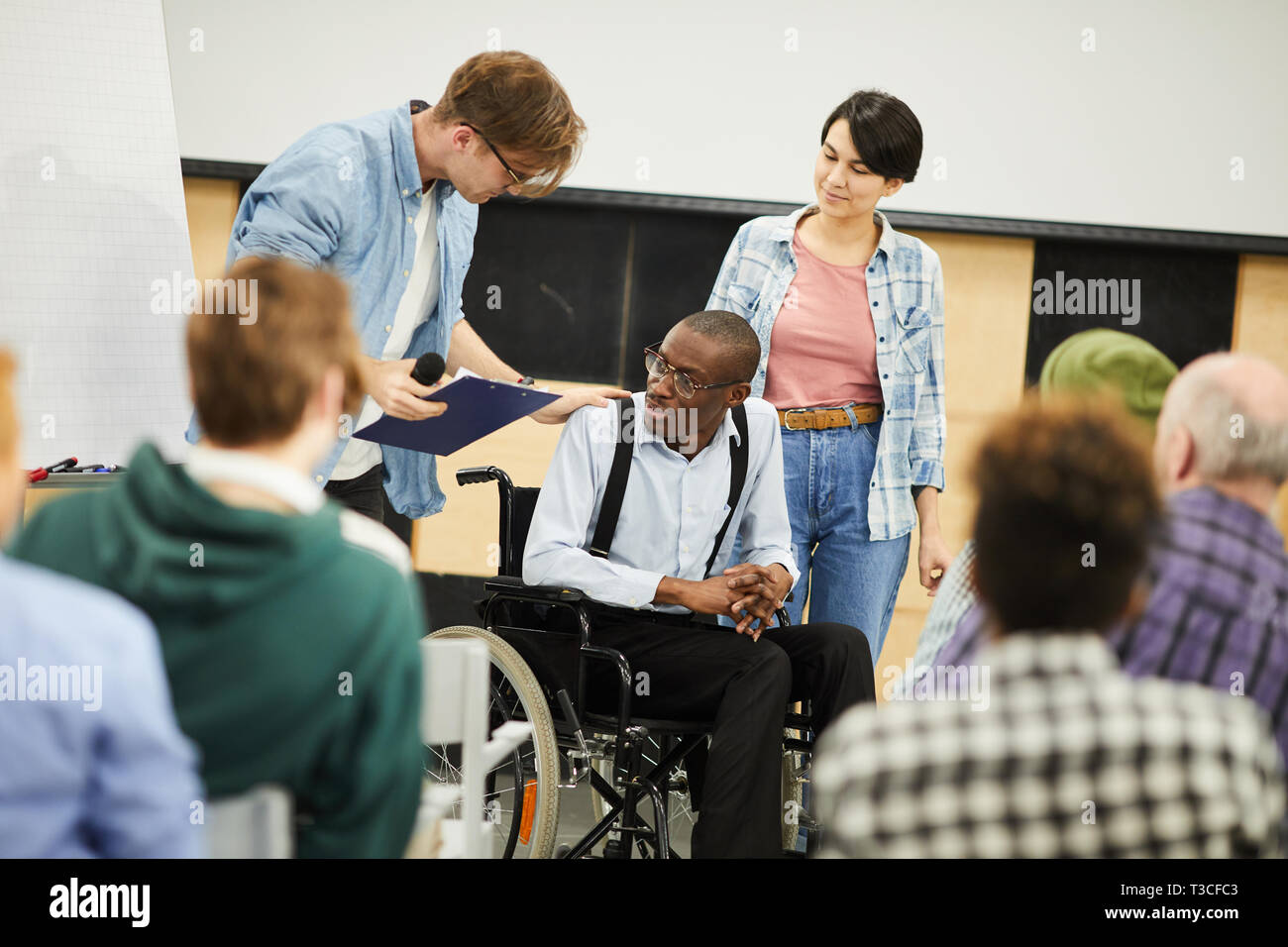 Live interaction with disabled young scientist Stock Photo - Alamy