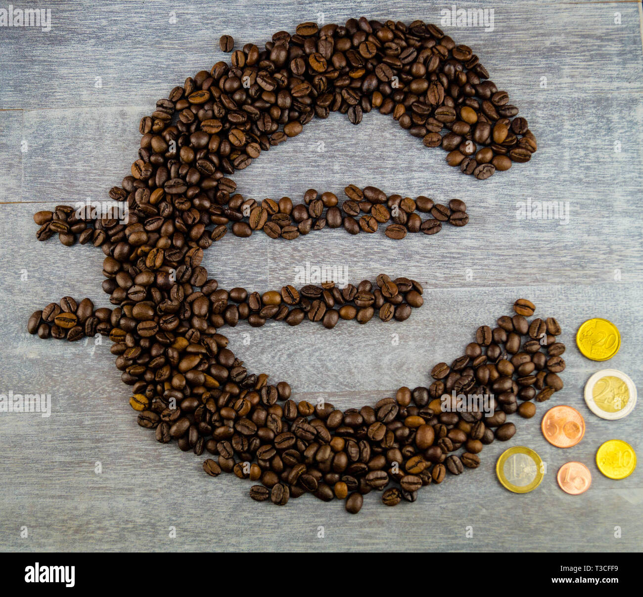 fair trade coffee Price - roasted coffee beans and money Stock Photo ...