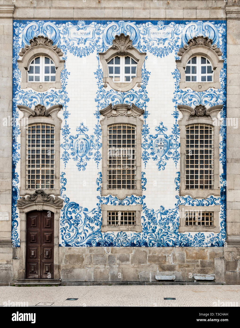 Blue and white painted ceramic tiles on a wall on the exterior of a ...