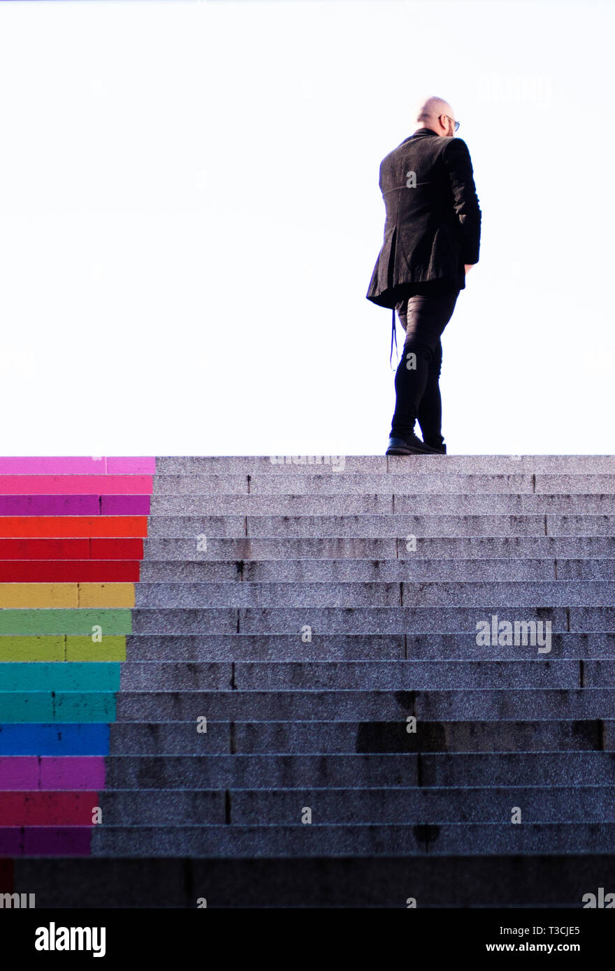 Standing at top of stairs hi-res stock photography and images - Alamy