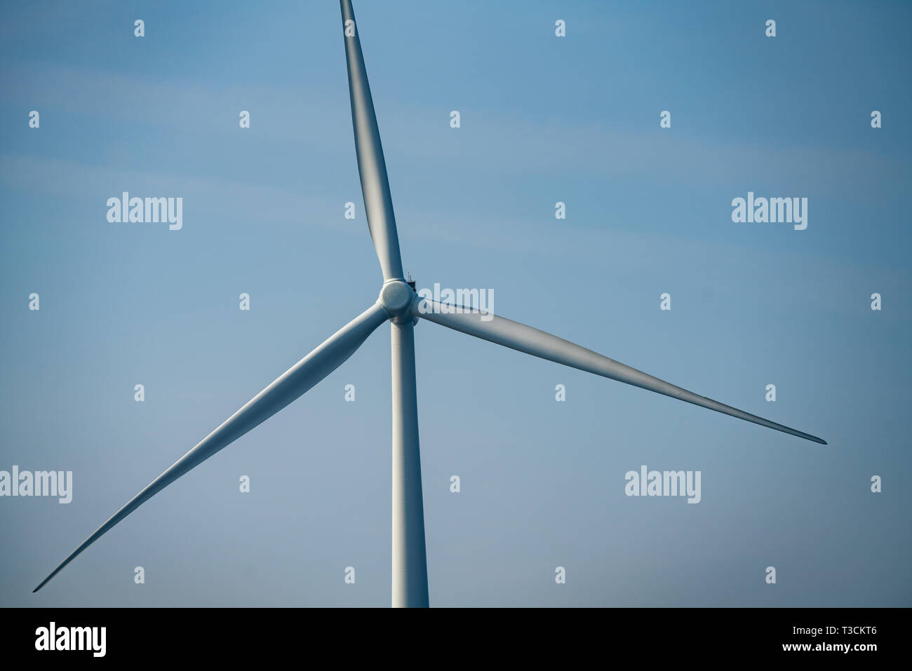 WindTurbines in a blue sea on a sunny day Stock Photo - Alamy