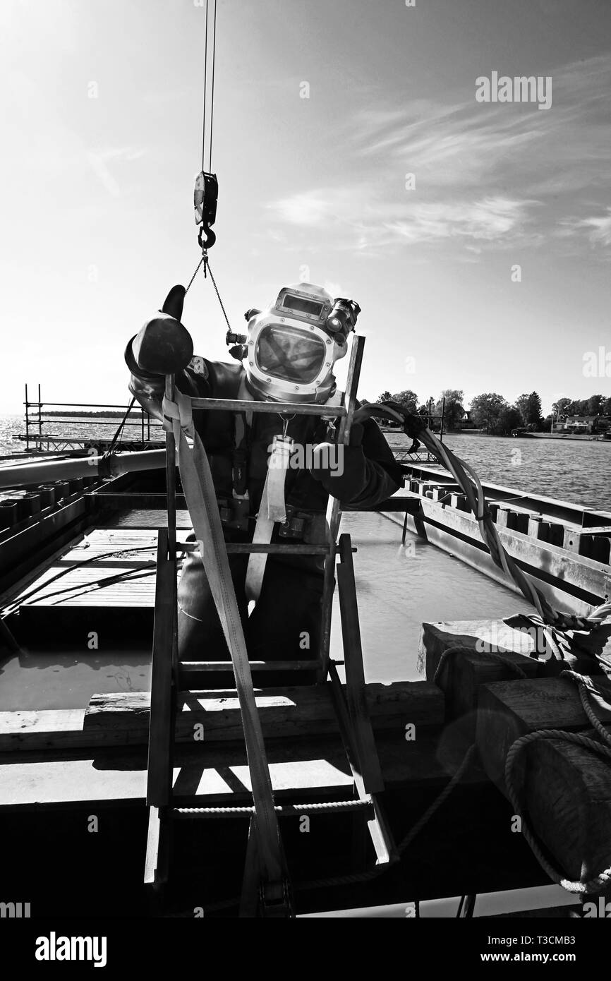 Heavy diver at a bridge building Stock Photo - Alamy