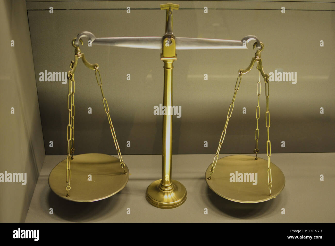 Weight scale in the Louvre museum Stock Photo - Alamy