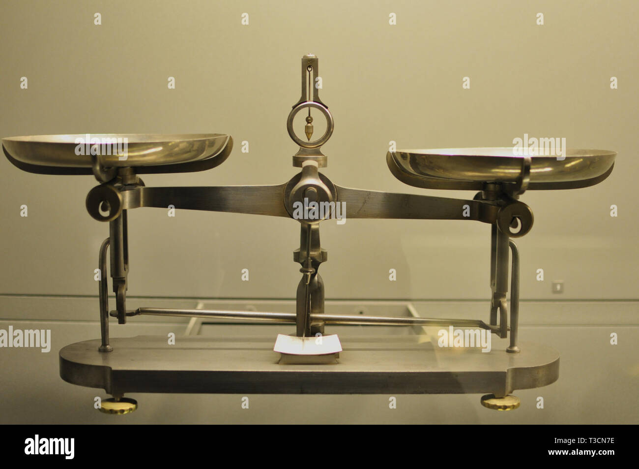 Weight scale in the Louvre museum Stock Photo - Alamy