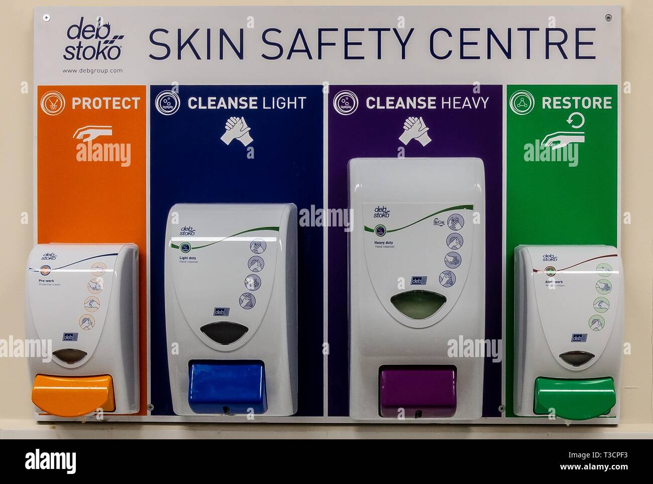 Deb Stoko Skin Safety Centre cream dispensers on a wall in a works ...