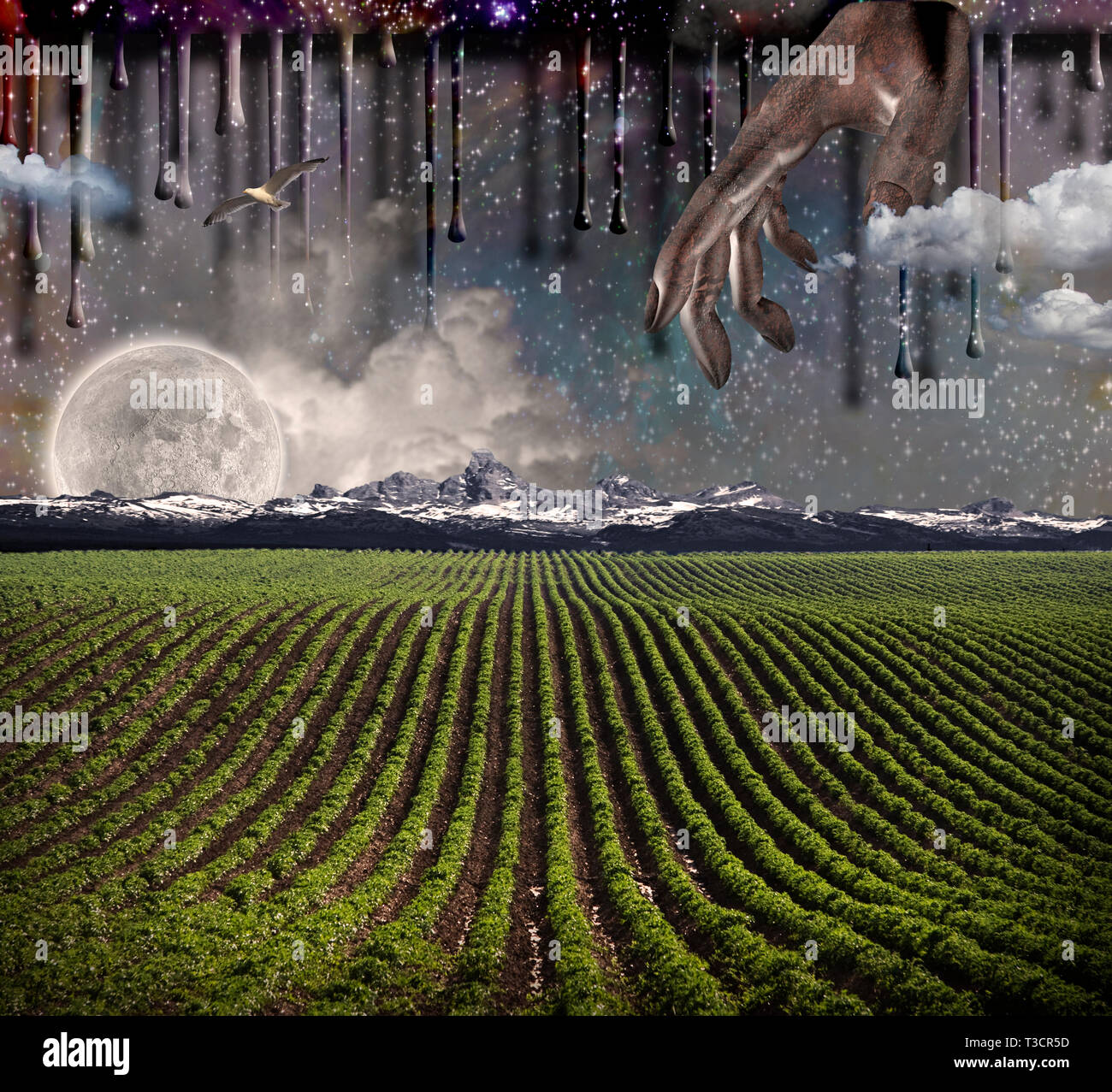 Surrealism. Field with green rows. Giant moon rises over the mountains ...