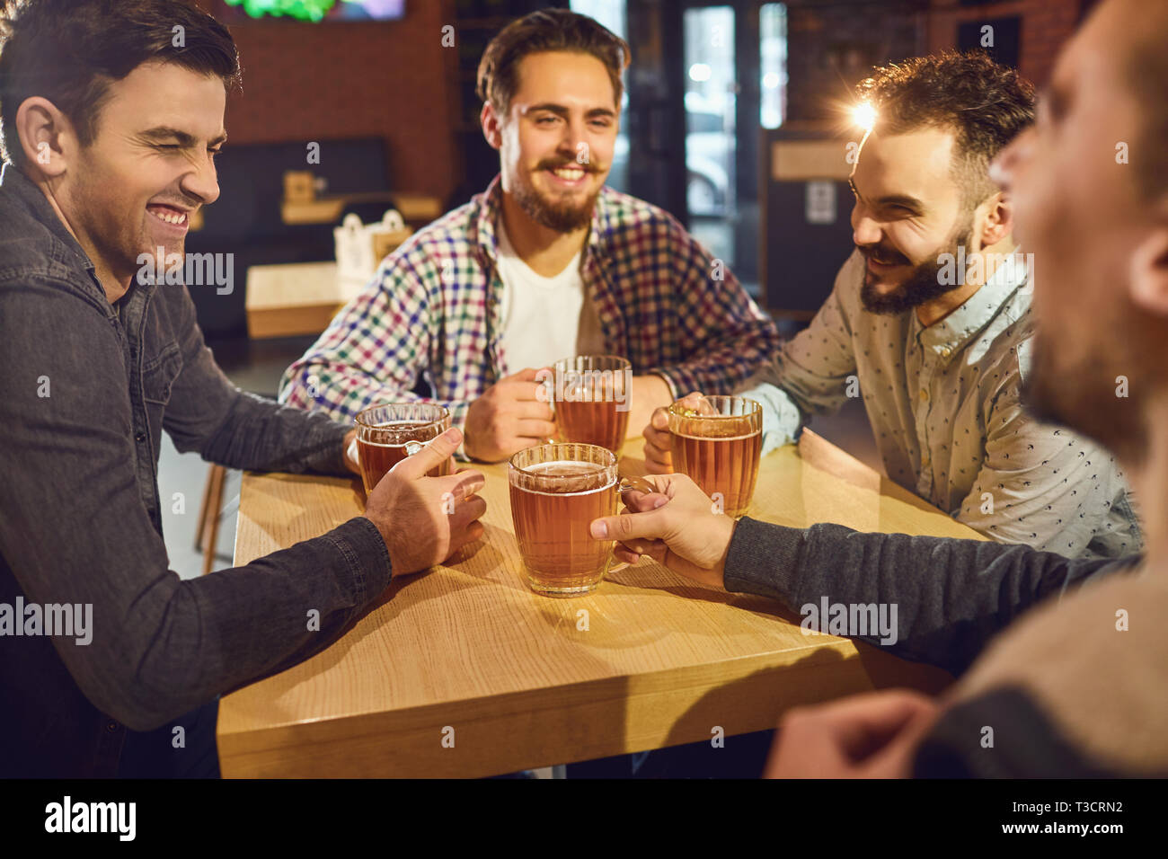 Young friends drinking drink hi-res stock photography and images - Alamy
