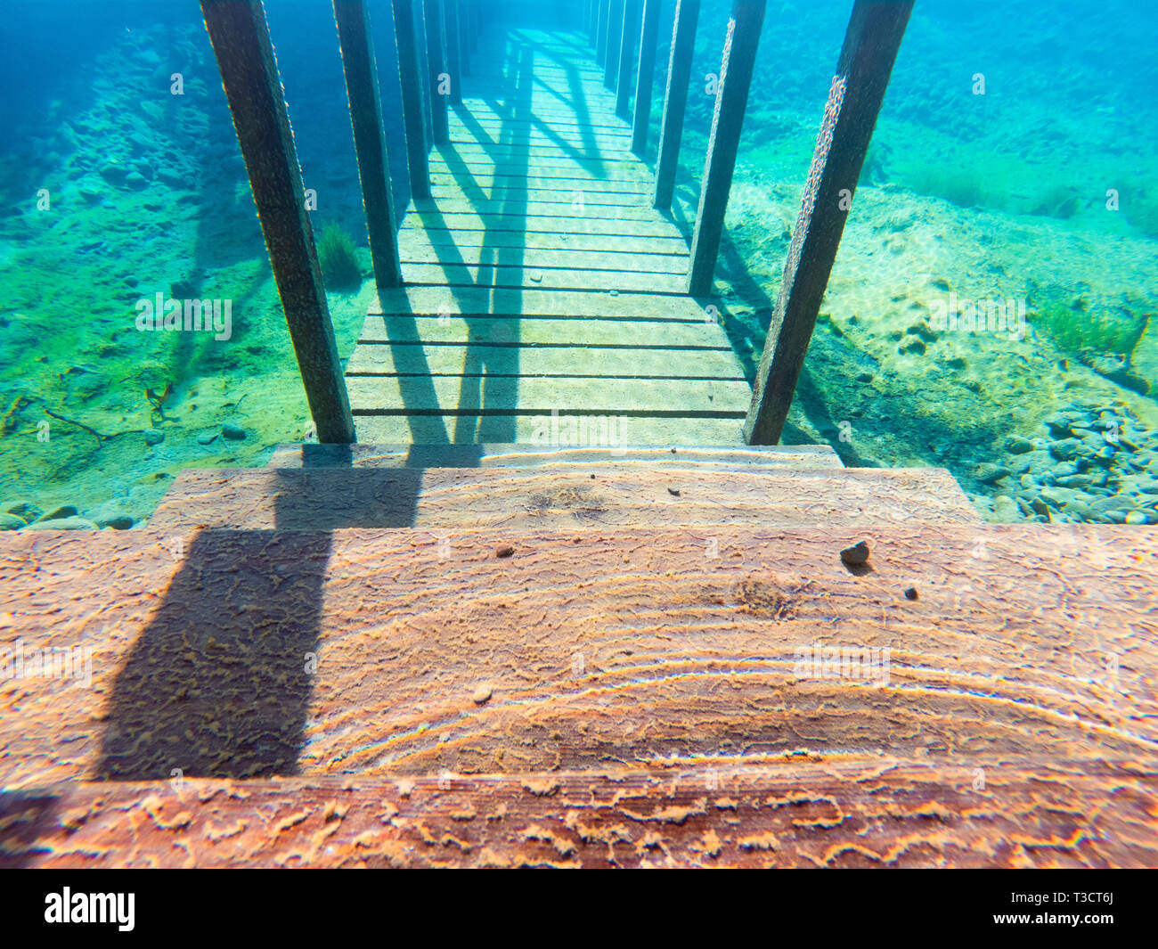 Stairs going to the green ocean water hi-res stock photography and ...