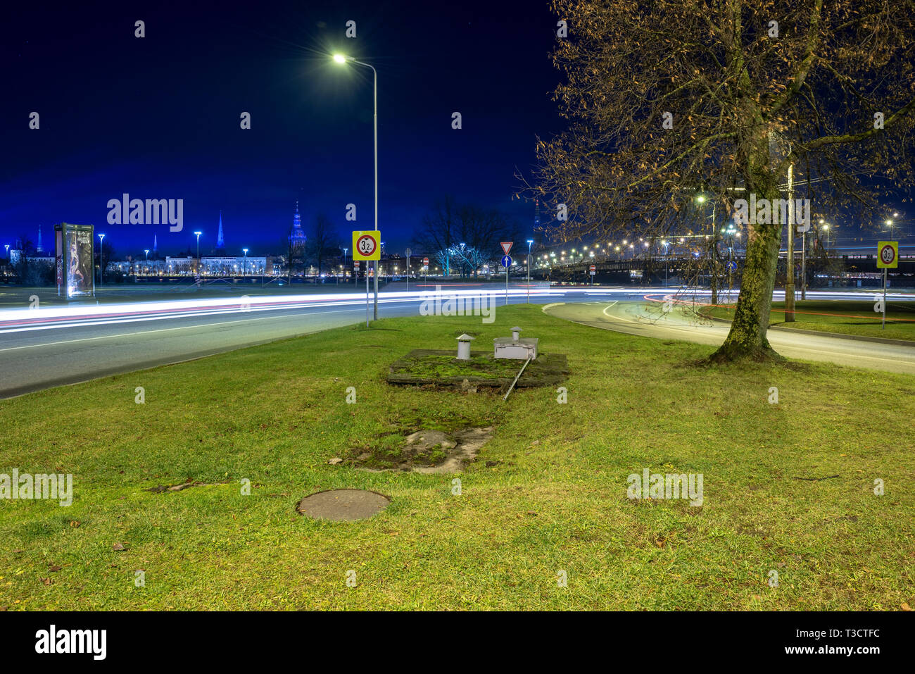 night street lights in Riga, Latvia. lines from cars and bridges Stock ...