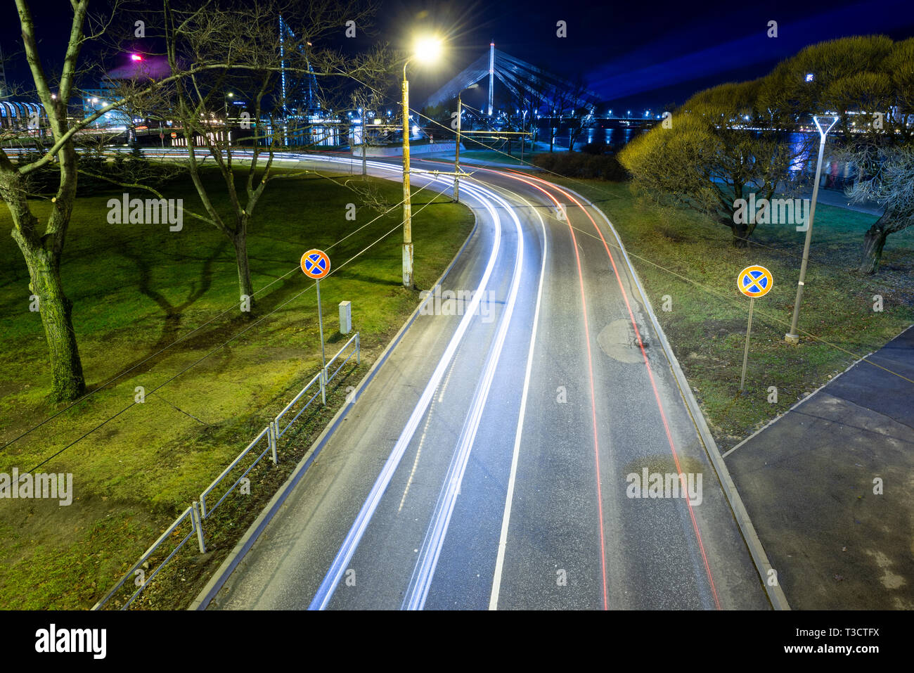 night street lights in Riga, Latvia. lines from cars and bridges Stock ...