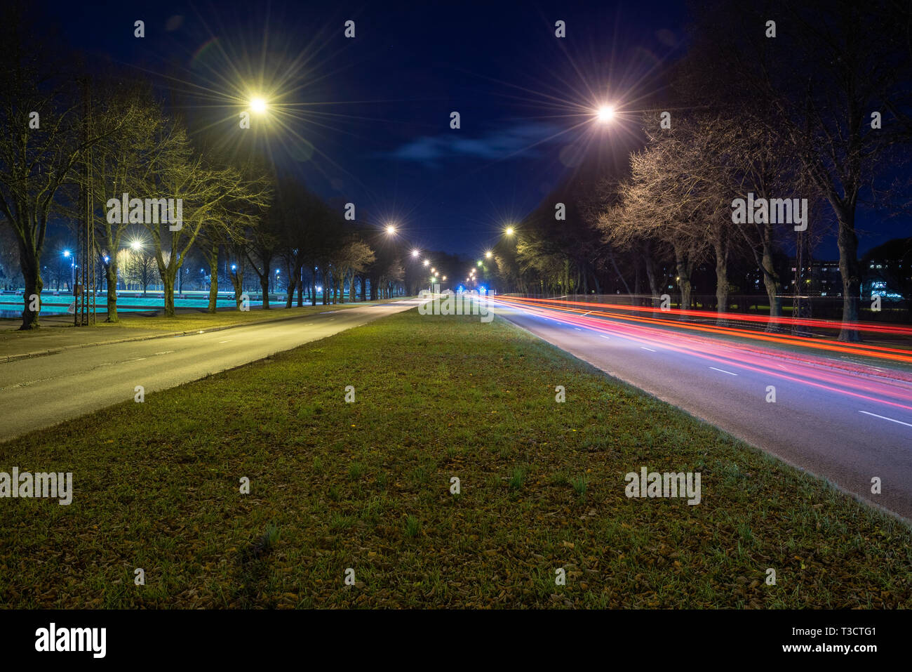 night street lights in Riga, Latvia. lines from cars and bridges Stock ...