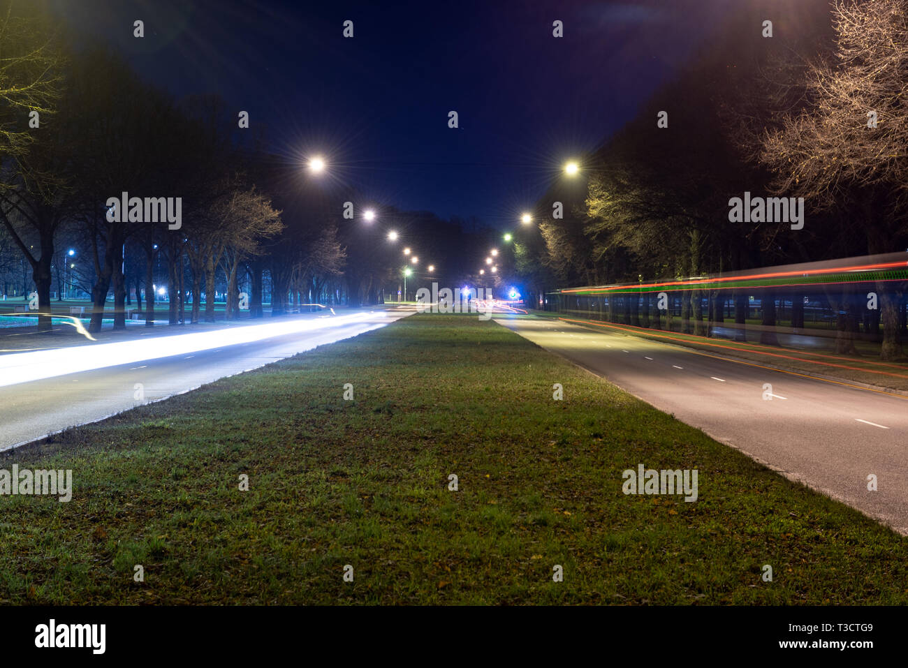 night street lights in Riga, Latvia. lines from cars and bridges Stock ...