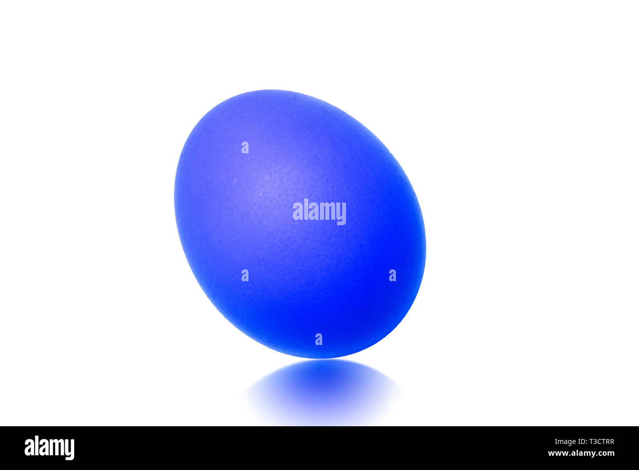 Blue egg isolated on white background Stock Photo - Alamy